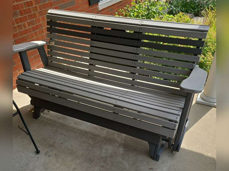 Plastic glider with center cup holder, approximately 5' long - Northern ...