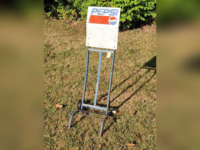 Metal Pepsi crate rack, needs tires - Northern Kentucky Auction, LLC