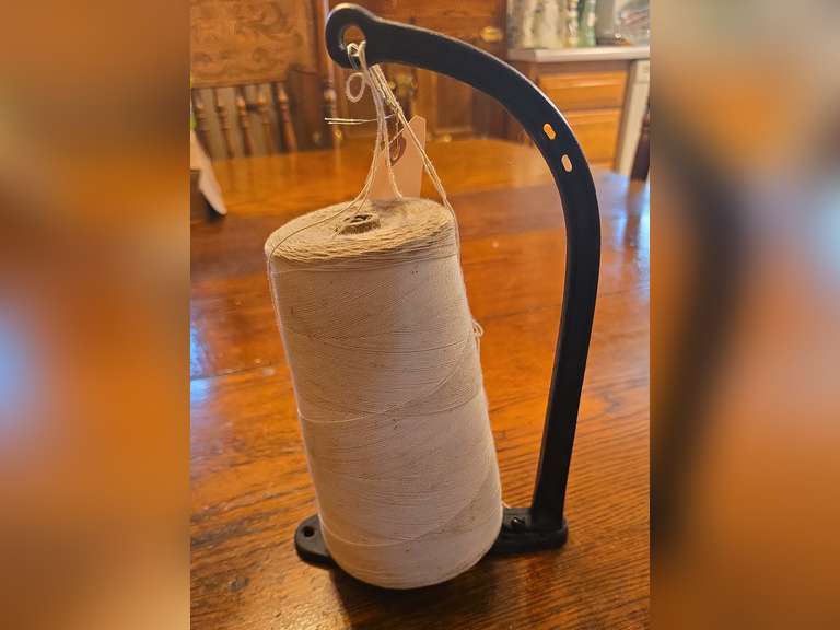 Vintage cast iron string holder - Northern Kentucky Auction, LLC