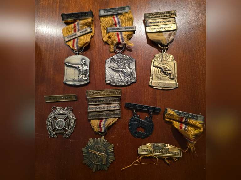 Brass pin medals - Northern Kentucky Auction, LLC