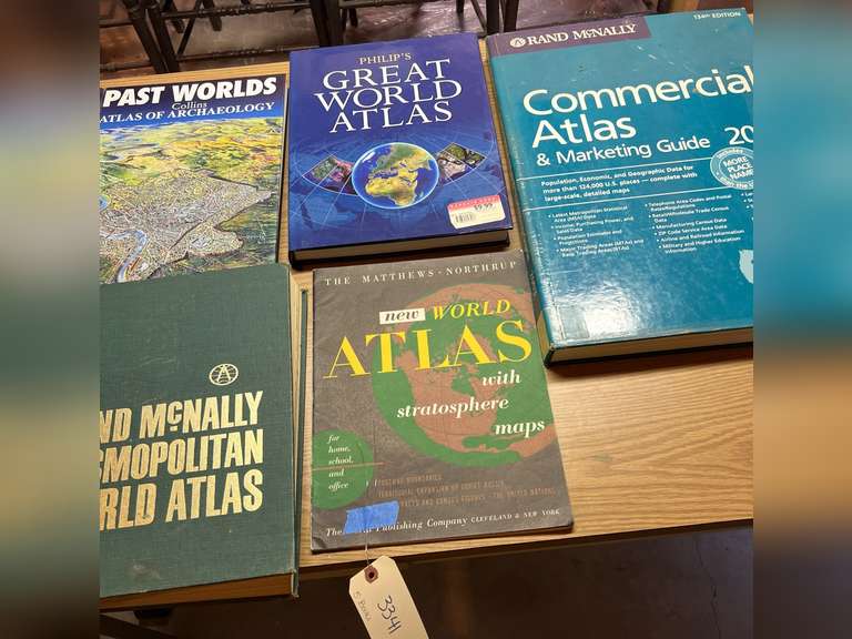 Hardback and one paper Atlas books. - Northern Kentucky Auction, LLC