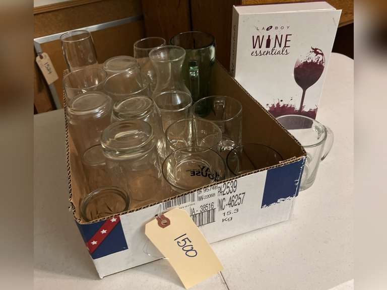 Assorted drinking glasses, stemmed glasses and 3 glass cups. Wine ...
