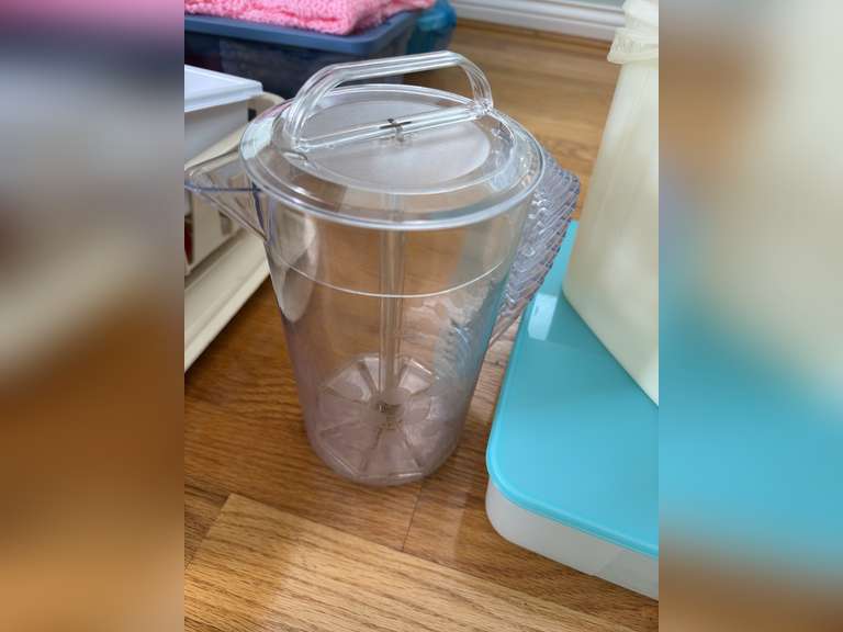 Tupperware, food and liquid storage containers plus a lemonade pitcher ...