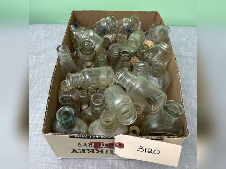 Small clear glass vintage bottles. - Northern Kentucky Auction, LLC