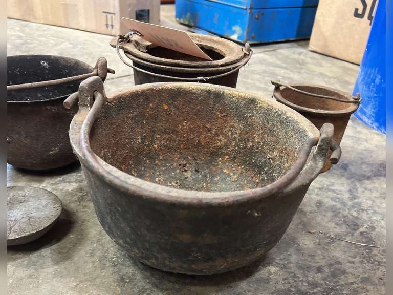 Four lead pots and one ball of lead. - Northern Kentucky Auction, LLC