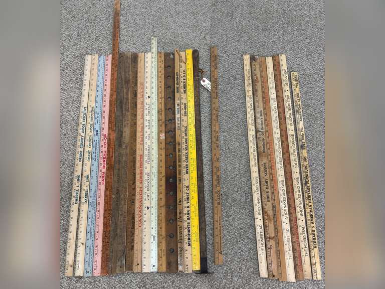Various Advertising Yard Sticks - Northern Kentucky Auction, LLC