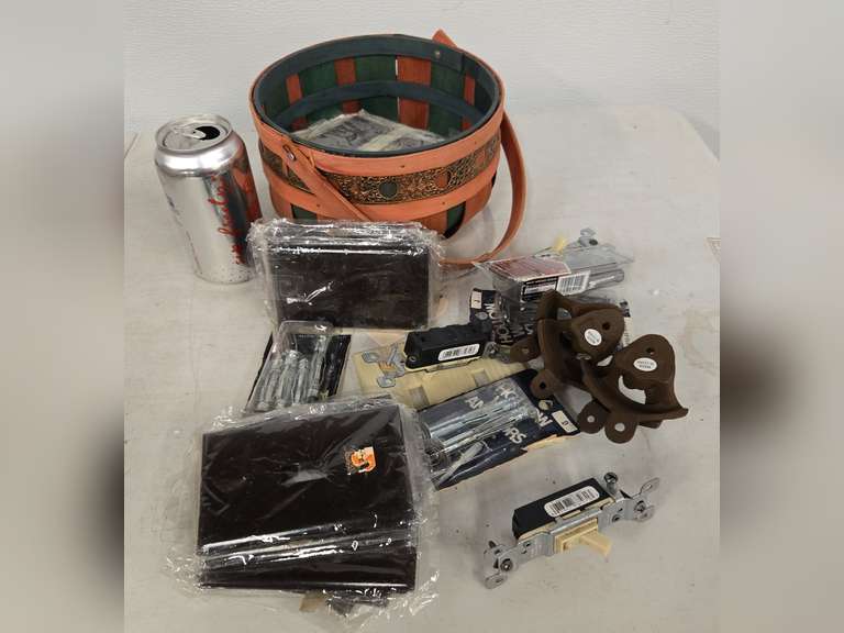 Small basket of electrical switches, plate covers, anchor screws, etc ...