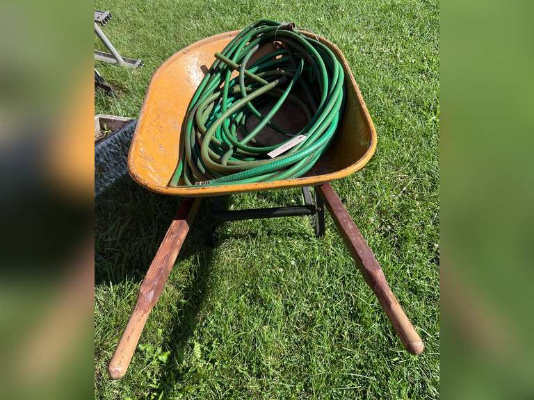 Wheelbarrow and water hose. - Northern Kentucky Auction, LLC