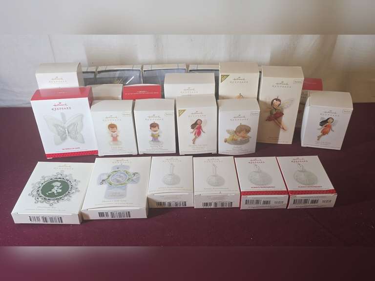24 Hallmark ornaments in boxes - Northern Kentucky Auction, LLC
