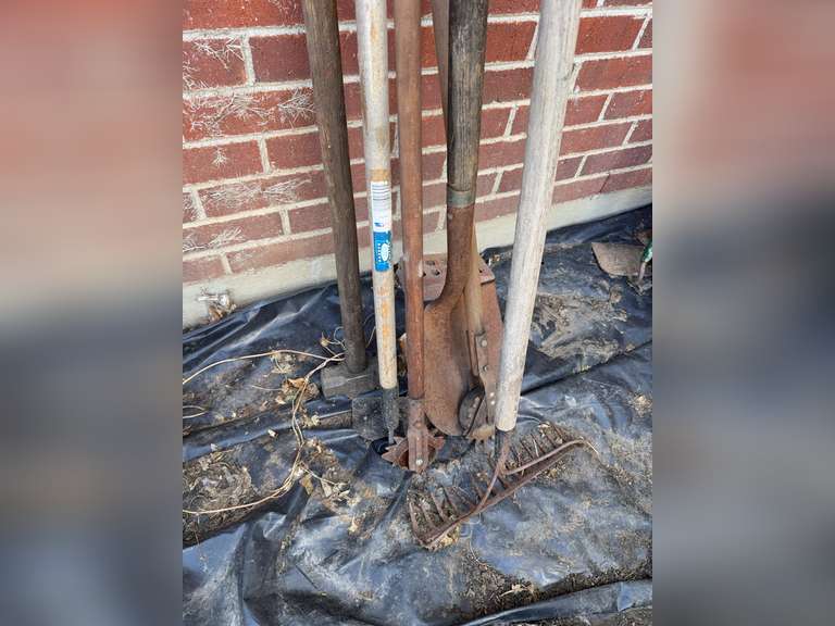 Yard tools, including hardrake, hoe, sledgehammer, spade shovel ...