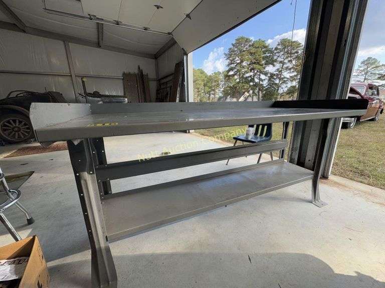 Metal work table 6' x 30in x 34in tall - Nutt Auction