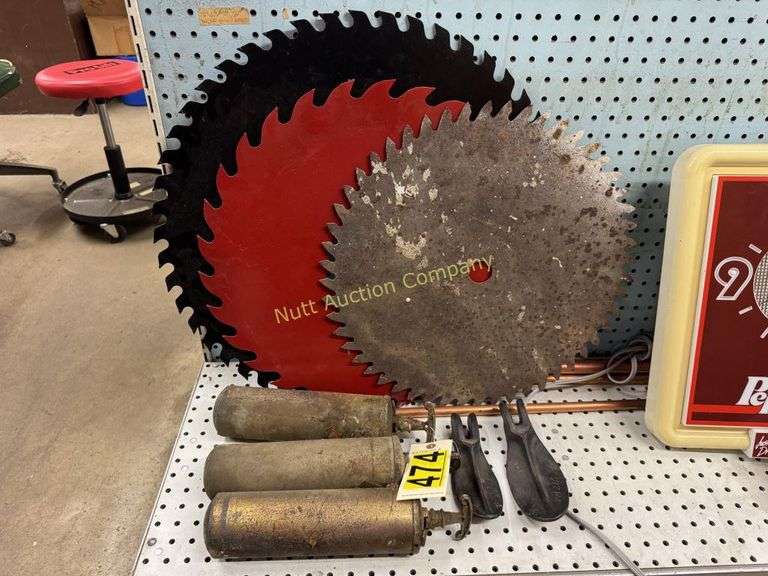 Brass fire extinguishers (3), saw blades, shoe irons - Nutt Auction