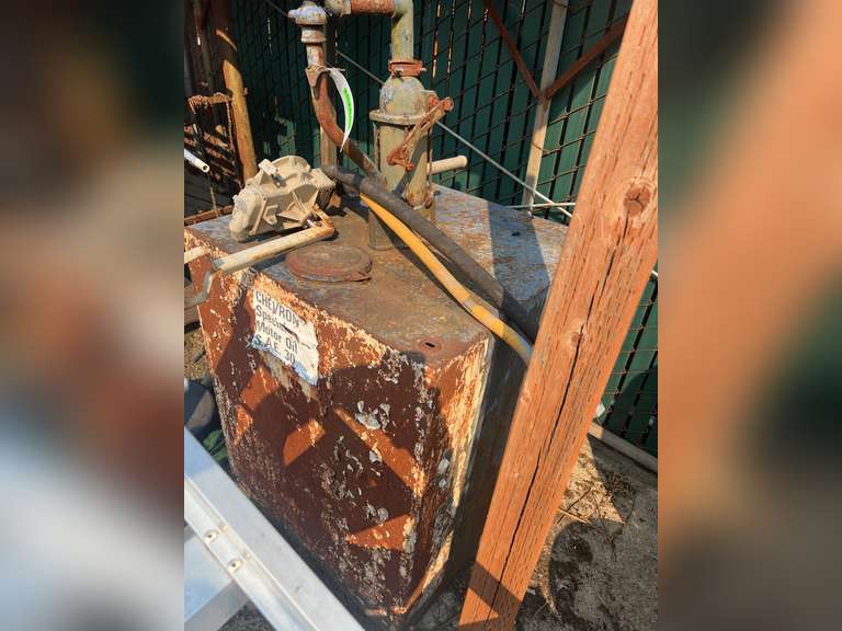 Large oil dispensing container with pump - NW Asset Services