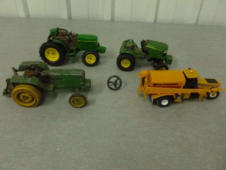 Group Of John Deere Die Cast Metal Tractors - Oberman Auctions
