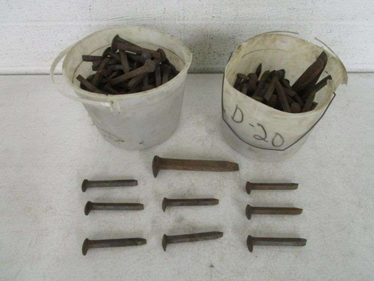 2 - Ice Cream Pails w/4" Railroad Type Spikes - Oberman Auctions