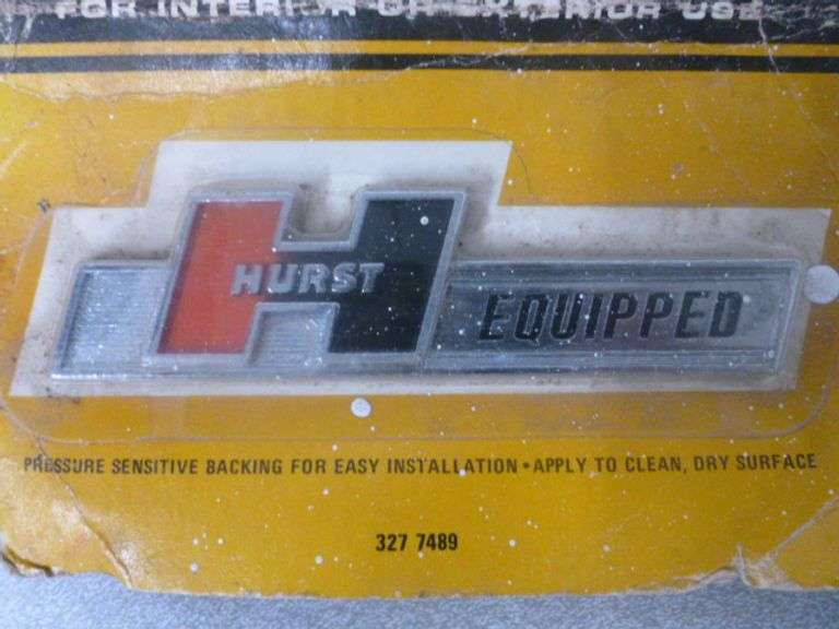 Hurst NOS - Metal Emblem No. 327-7489 - Oberman Auctions