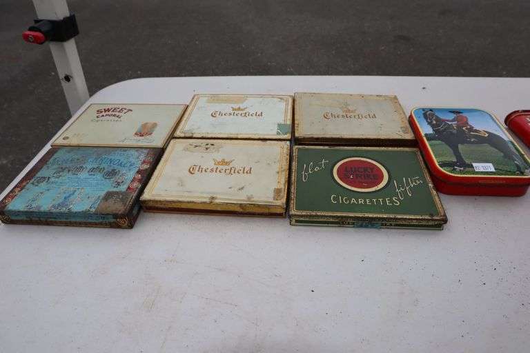 7 metal cigarette boxes - Pacific Auctions And Appraisals
