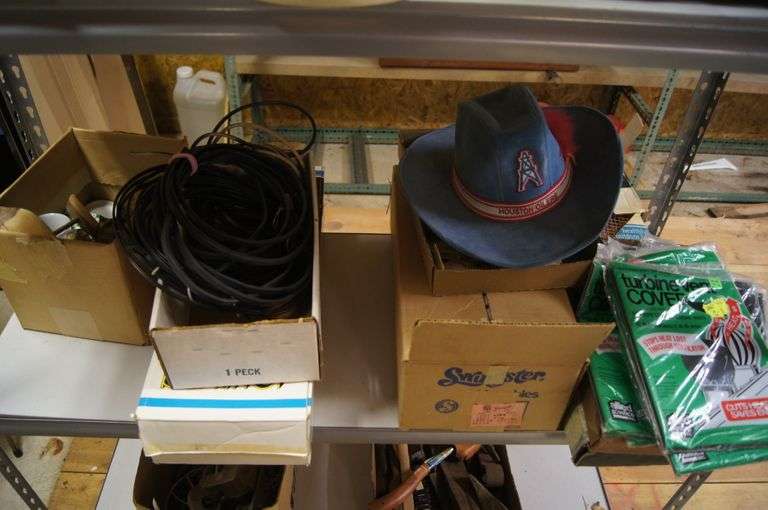 Contents of shelf (safety belts and straps, miscellaneous tools ...