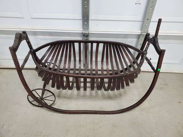 Field/slave cradle, all original wood, with cast iron spoke wheels ...