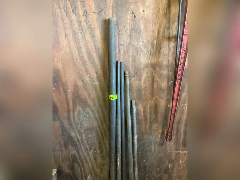 Large Pieces of Metal Pipe Shaped Like Pry Bar - Parrott Marketing Group