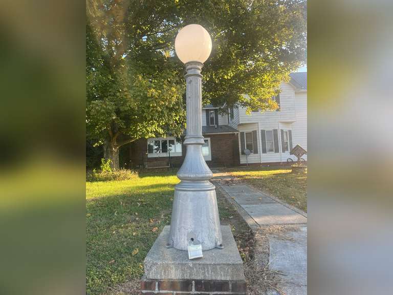 2 mounted lamp posts - Parrott Marketing Group