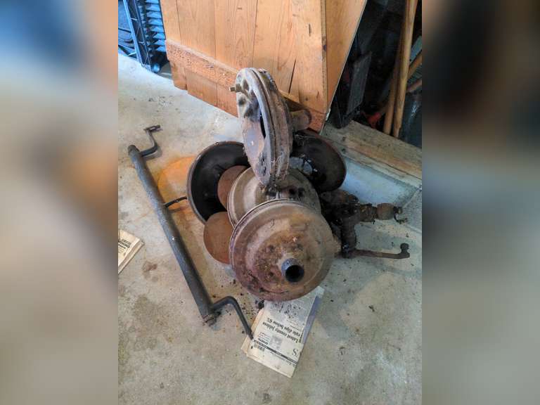 Group of Ford model A parts including steering components and drums ...