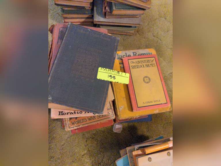 2 stacks of various classical books - Parrott Marketing Group