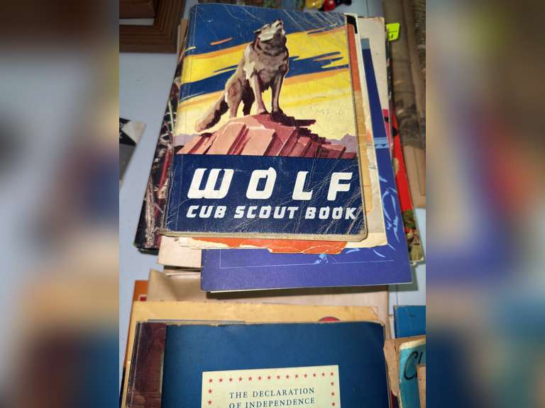 Wolf Cub Scout book, bird feeder book, baseball rules, and more ...