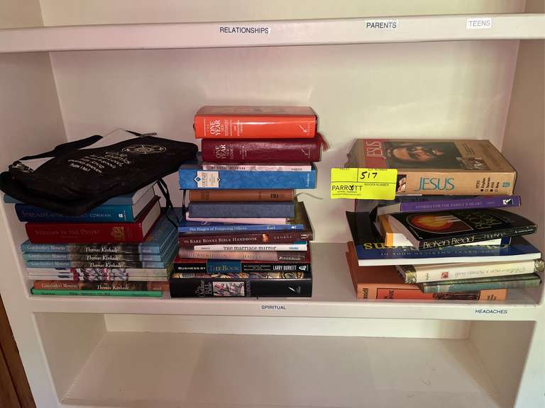 Shelf of various religious books - Parrott Marketing Group