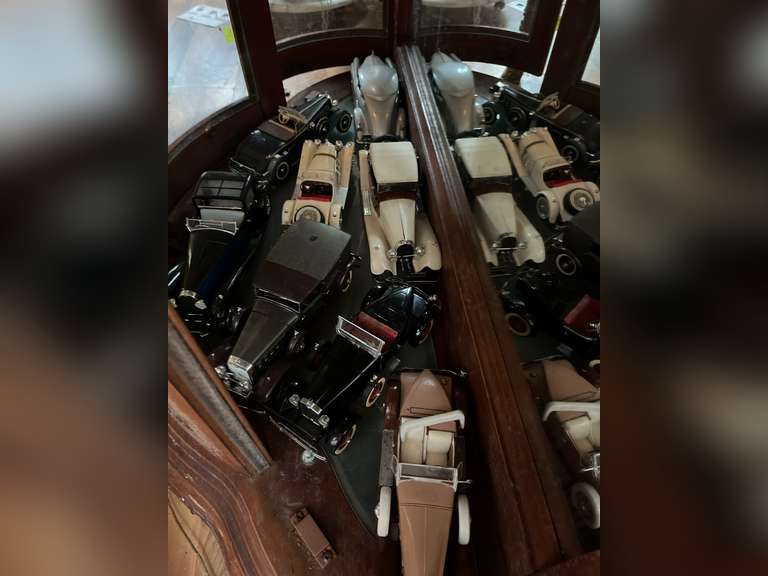 Bottom shelf of model cars - Parrott Marketing Group