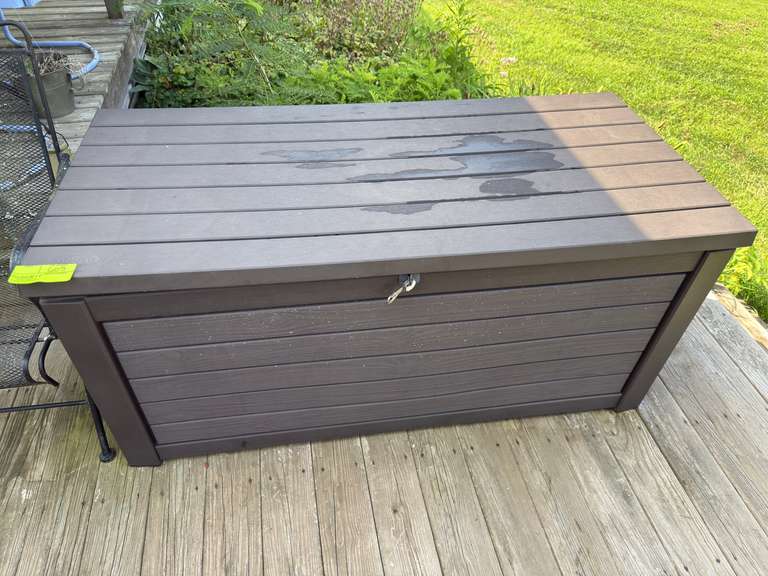 Outside storage box with contents - Parrott Marketing Group, LLC