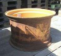 G-1129 Case 580 Backhoe Rim - Pickett Auction Service