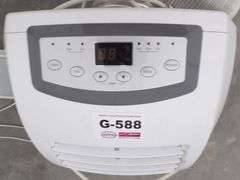 G-588 A/C Unit + Box Fan - Pickett Auction Service