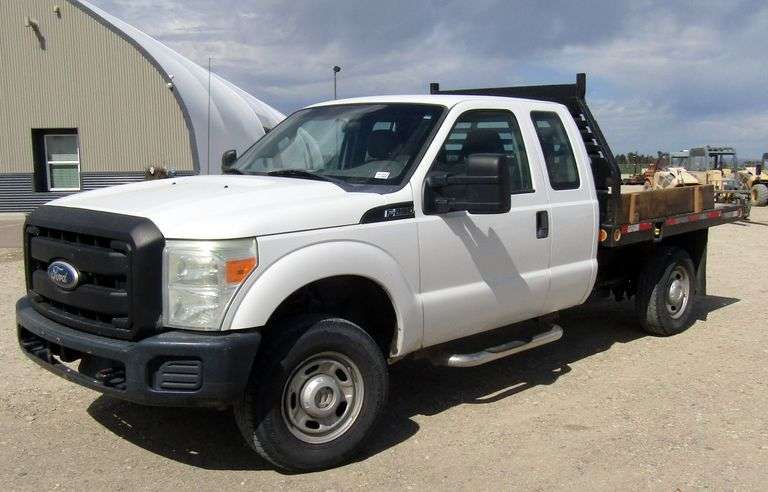 U-202 2011 Ford F250 Flatbed Pickup - Pickett Auction Service