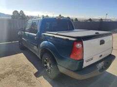 TITLE - 2002 FORD EXPLORER SPORT TRAC - Peak Auto Auctions