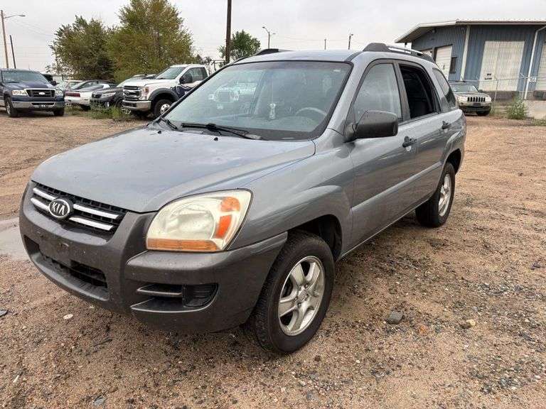 Title - 2005 KIA SPORTAGE - Peak Auto Auctions