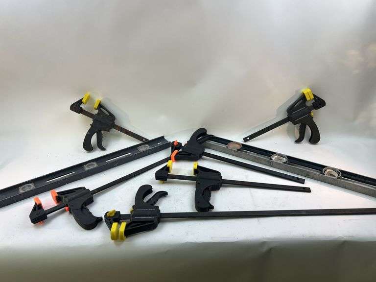 Basket of Clamps & 2' levels - Peterson Land & Auction LLC