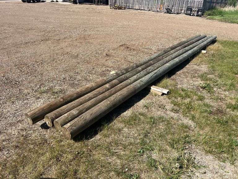 6” x 22’ Green Treated Posts - Peterson Land & Auction LLC