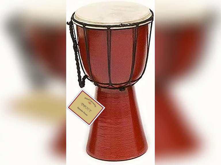 Drum Djembe is a Rope goat skin Covered Goblet African Drum Played by ...