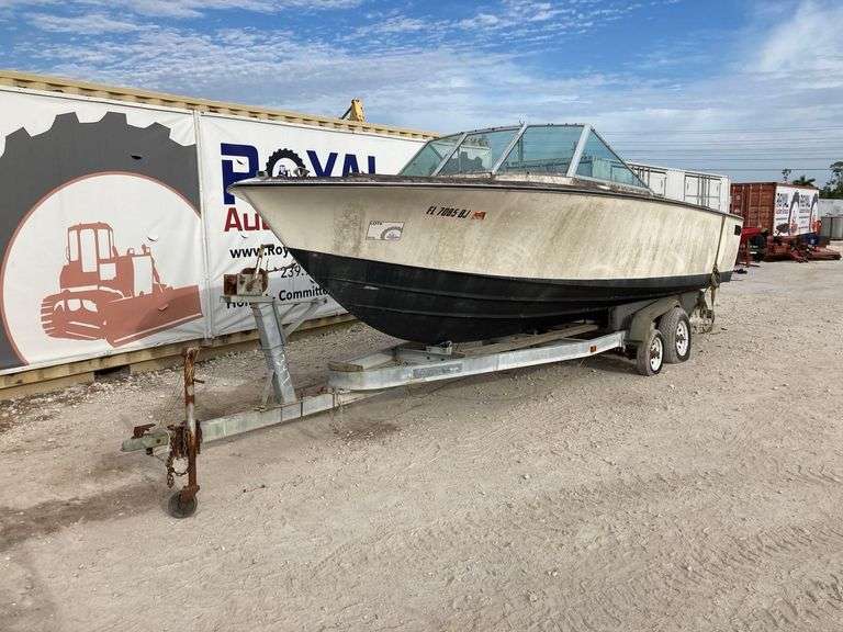 21 Foot Boat w/Onboard Engine - Royal Auction Group