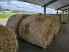 2 Round Bales 1st (4x5) Stored Inside - Rogers Community Auction Inc.