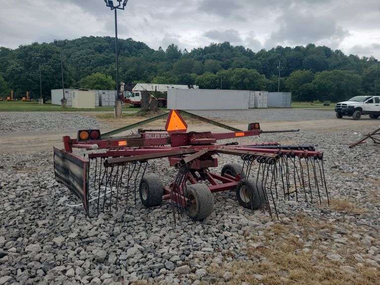 Miller Pro 1150 Rotary Rake w/ Windrower - Rogers Community Auction Inc.