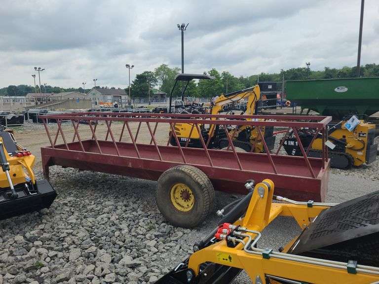 Farmco 4' x 16' Feeder Wagon - Rogers Community Auction Inc.