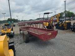 Farmco 4' x 16' Feeder Wagon - Rogers Community Auction Inc.