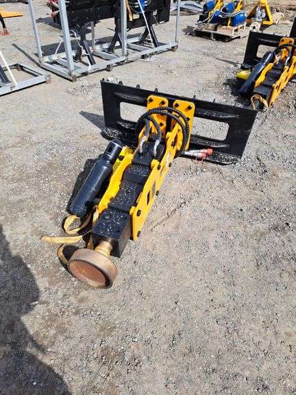 Giyi Skid Loader Post Driver Attachment - Rogers Community Auction Inc.