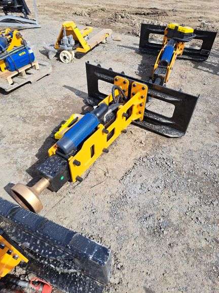 Giyi Skid Loader Post Driver Attachment - Rogers Community Auction Inc.