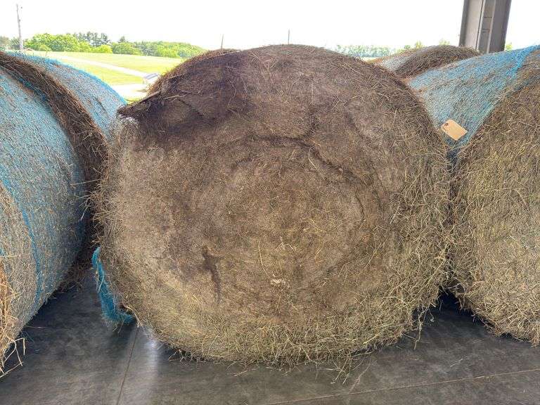 2 Round Bales 2nd Grass (4x5) - Rogers Community Auction Inc.