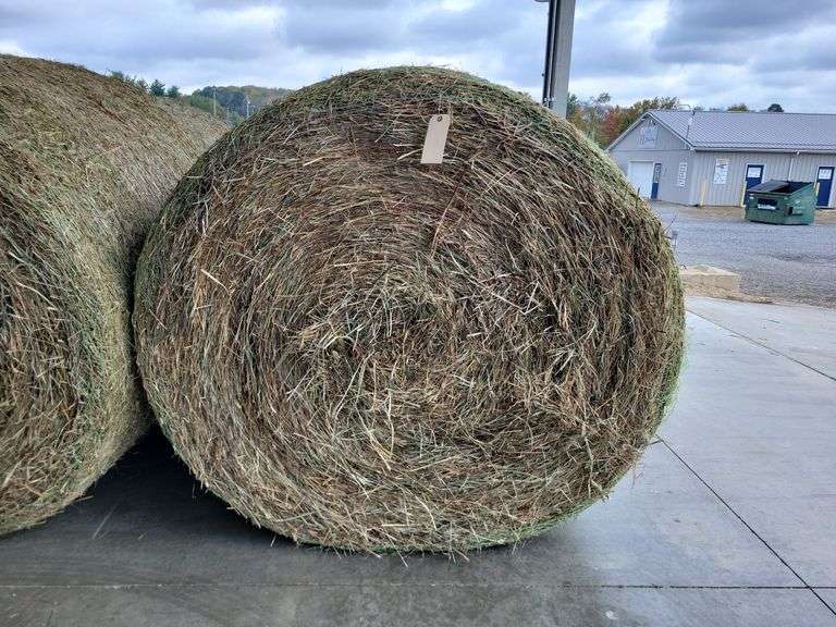 2 Round Bales 2nd Grass (4x5) Stored Inside - Rogers Community Auction Inc.