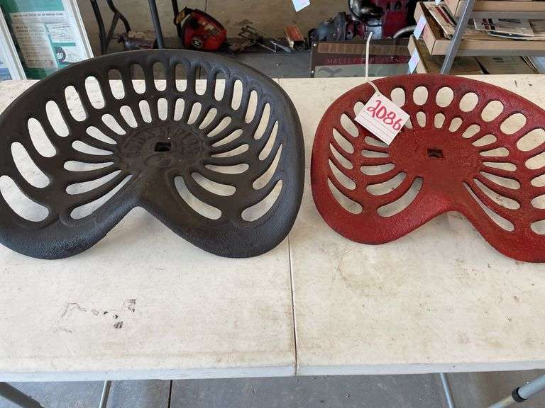 (2) Cast Iron Tractor Seats - RES Auction Services