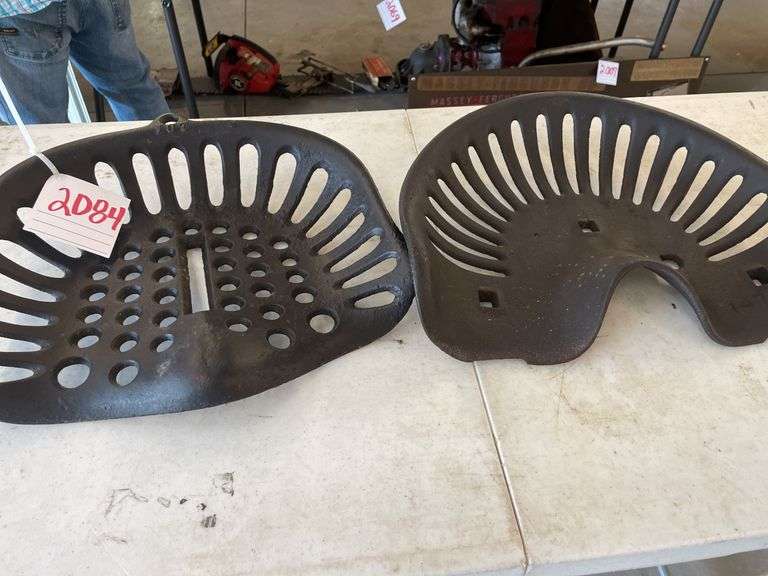 (2) Cast Iron Tractor Seats - RES Auction Services